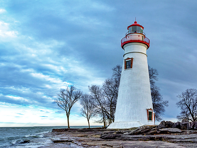 When Lake Erie shows its moody side, the lighthouse stands firm against the elements, just as it has through countless storms since 1821.