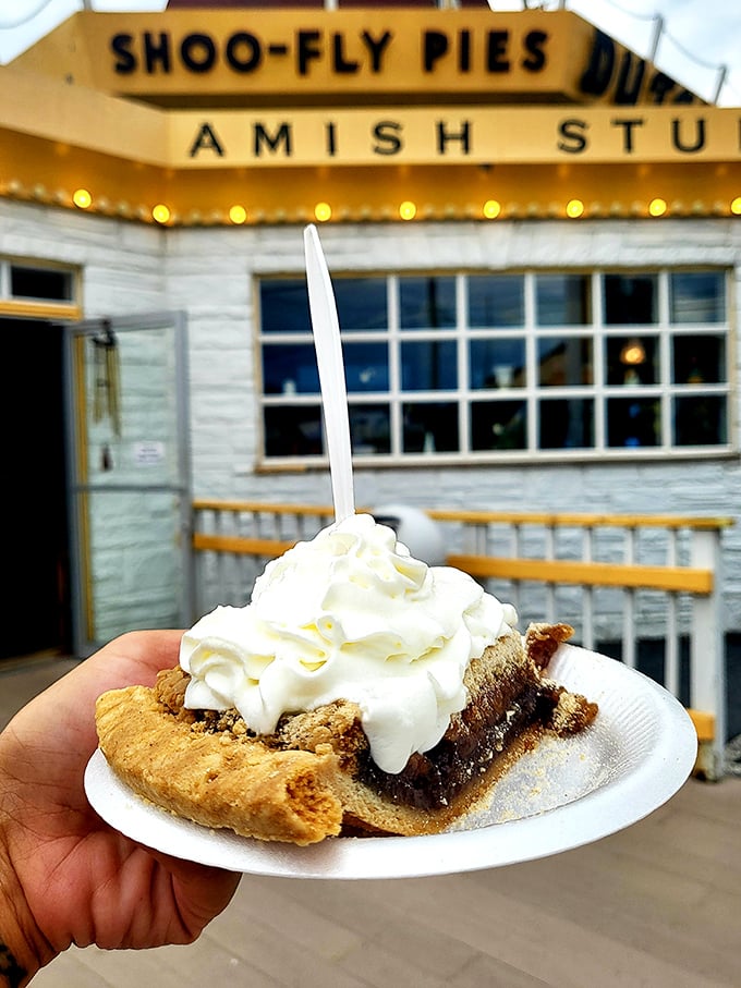 A slice of heaven topped with whipped cream. The wet-bottom shoofly pie reveals its signature gooey layer that's worth every mile of the journey.