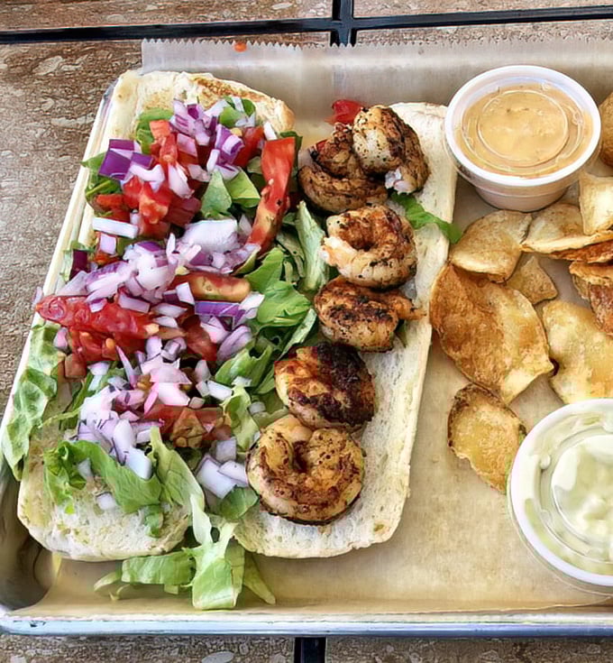 Seafood poetry on a bun. Fresh shrimp nestled on a bed of crisp vegetables, ready to transport your taste buds straight to the Gulf.