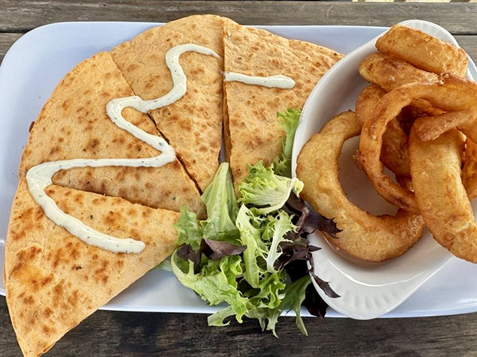 A quesadilla that's had a beachfront upgrade, with crispy edges giving way to a gooey interior studded with Gulf shrimp.