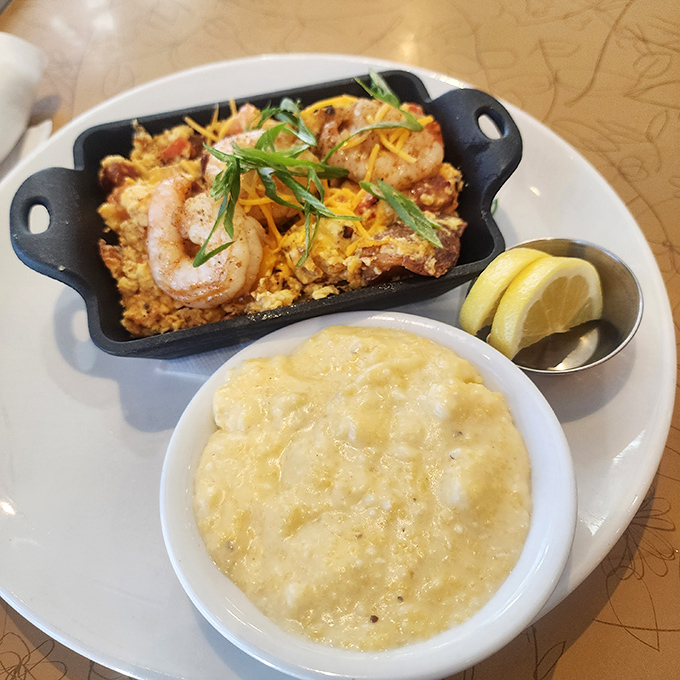 Gulf shrimp perched atop creamy grits like little treasures from the sea. This cast iron masterpiece is what Southern comfort tastes like when it's showing off.