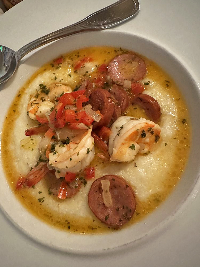 A Southern-meets-Provence love story where plump shrimp and savory sausage swim in creamy grits &ndash; comfort food that got its passport stamped.
