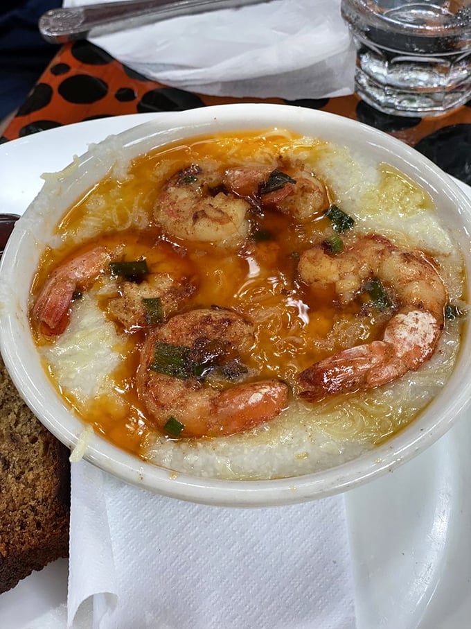 Shrimp and grits elevated to an art form&mdash;plump Key West pink shrimp lounging in creamy grits like they're on vacation too.