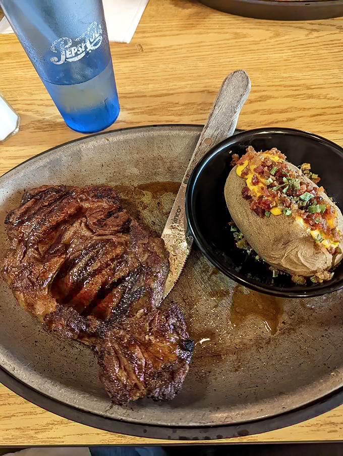 A steak that doesn't need fancy sauces to impress, paired with a loaded baked potato that's practically a meal unto itself.