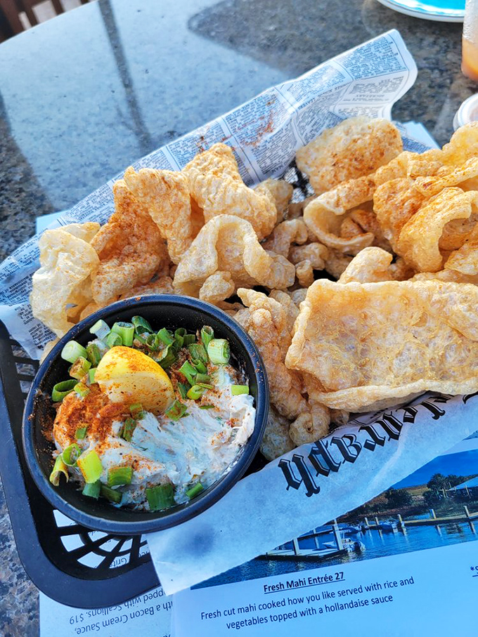 Pork rinds with smoked fish dip – the Florida equivalent of chips and guacamole, only with more maritime swagger and coastal flair.