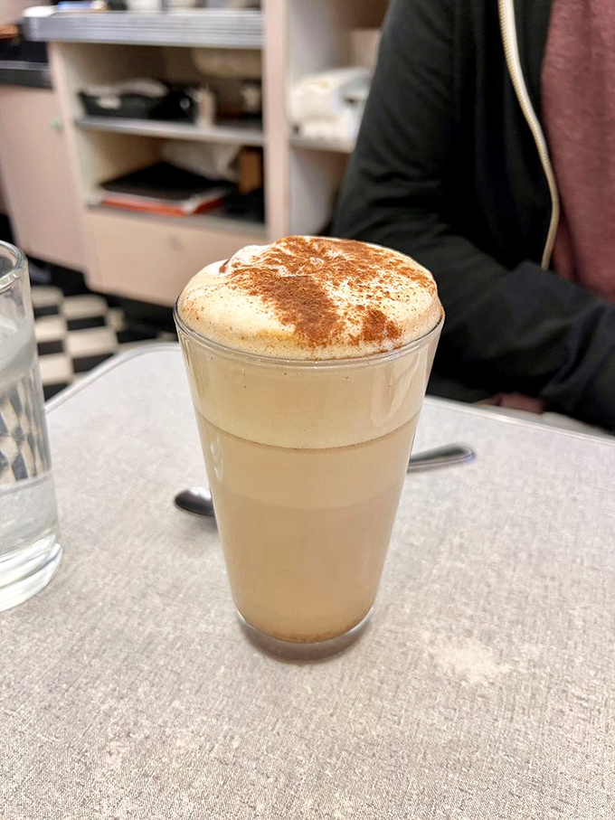 That's not just a latte&mdash;it's a warm hug in a glass, topped with cinnamon that makes your regular coffee order seem like a sad mistake.