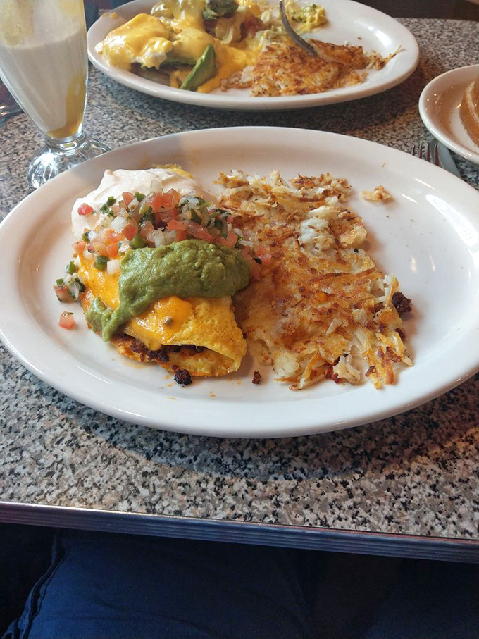 Southwest omelet loaded with fresh salsa and avocado - proof that breakfast can be both hearty and healthy.