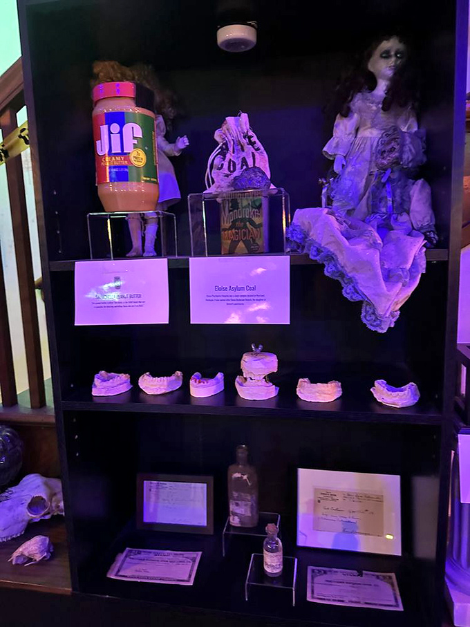 Nothing says "sweet dreams" quite like a porcelain doll, jar of peanut butter, and what appears to be a bag of coal. Childhood nightmares, beautifully preserved.