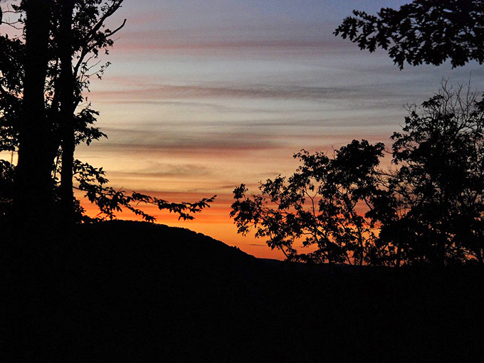Mother Nature shows off her painting skills at sunset, turning the Pennsylvania sky into a canvas of oranges and pinks above Emporium's mountain silhouette.