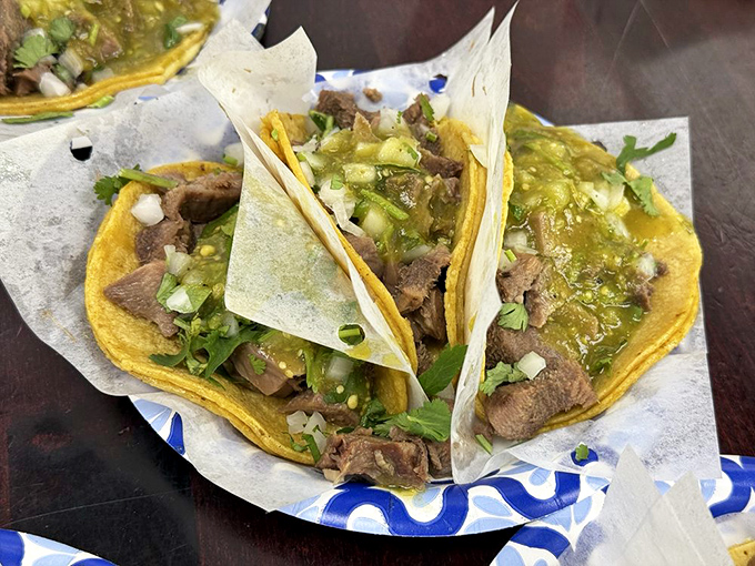 Lengua tacos that would make your grandmother weep with joy, paired with that zippy green salsa that brightens everything it touches.
