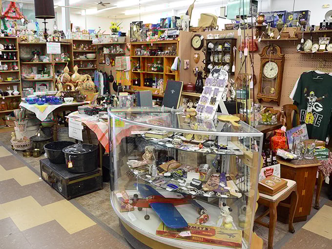 Navigation requires strategy in these packed aisles. One wrong turn and you might emerge three hours later clutching a vintage butter churn.