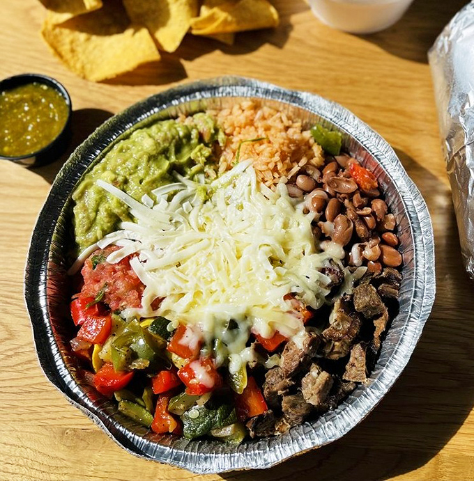 Not so much a burrito bowl as a festival of colors and textures. Each section is its own neighborhood in a delicious little city.