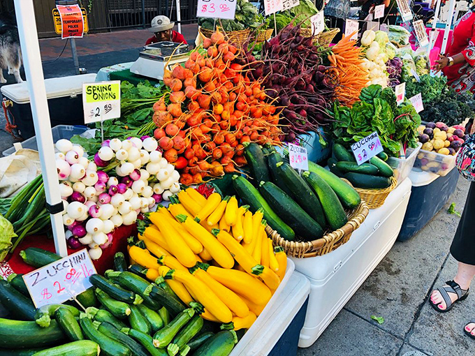 Nature's color wheel spins wildly at produce stands, where carrots, zucchini, and radishes compete in a beauty pageant that's actually good for you.