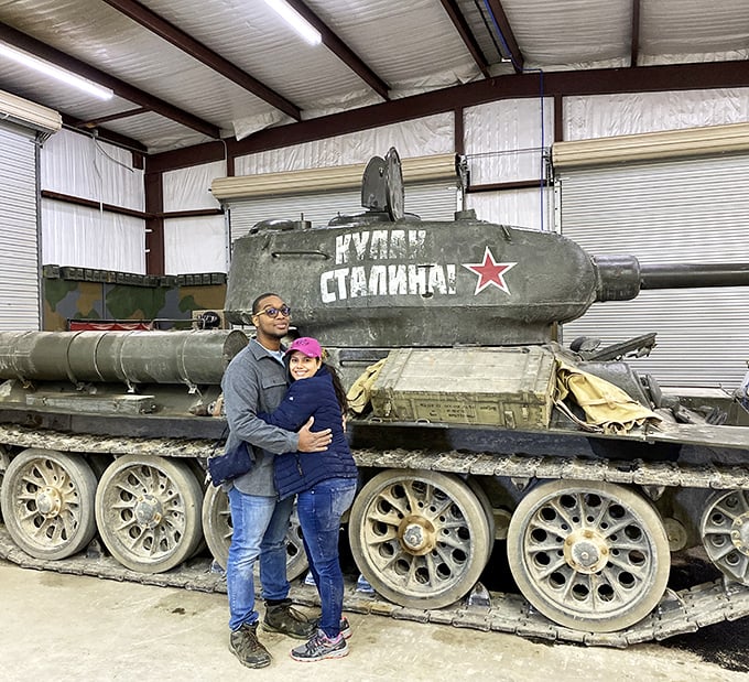 Creating memories that will outlast any souvenir t-shirt. Visitors pose with a legendary T-34 tank, a rare Soviet beast in Texas territory.