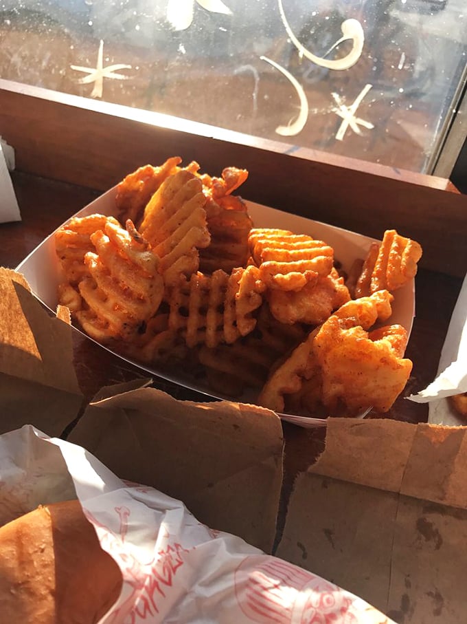 Waffle fries that achieve the perfect golden-brown crispiness &ndash; the supporting actor that sometimes steals the show from the burger star.