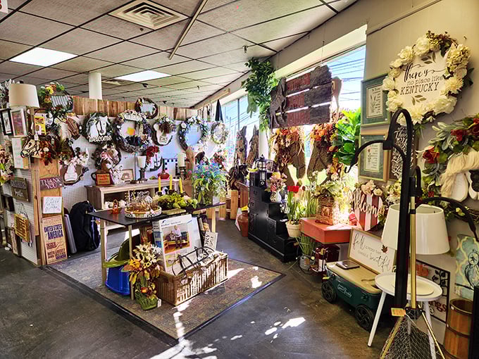 Kentucky pride blooms alongside seasonal wreaths. This booth perfectly captures the blend of local spirit and decorative flair that defines the market.