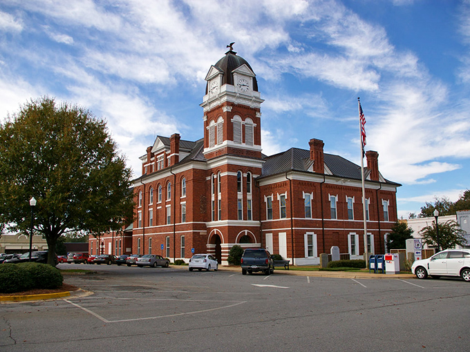 Sandersville's crown jewel&mdash;the Washington County Courthouse dominates the skyline with its distinctive clock tower and red brick grandeur, anchoring the community since the late 19th century.