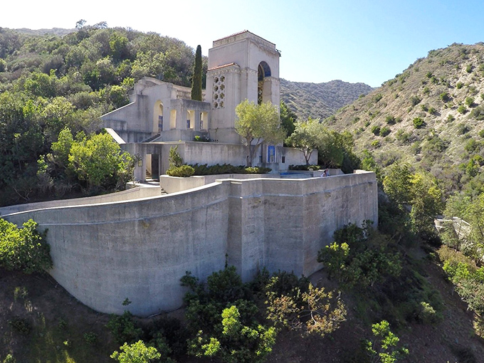 The Wrigley Memorial stands like a silent sentinel in the hills, proving that chewing gum magnates had impeccable taste in architecture and island real estate.