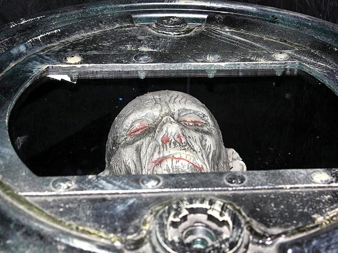 This ghoulish face peering from the darkness reminds us why we check under the bed at night.