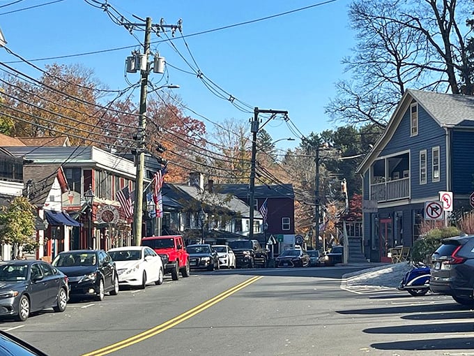 Chester's Main Street in autumn &ndash; where even the telephone wires seem to be arranged with aesthetic purpose against that perfect New England sky.