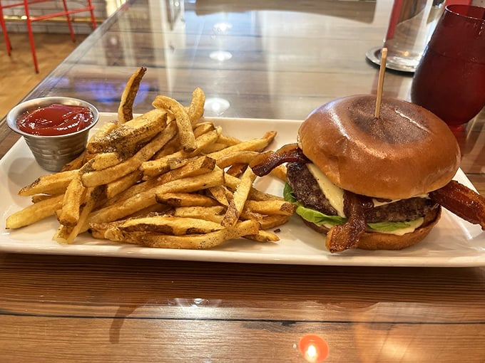 The burger that launched a thousand road trips&mdash;juicy, bacon-topped perfection with hand-cut fries that deserve their own fan club.