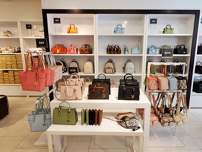 Designer handbags arranged like museum exhibits&mdash;except here, touching is encouraged and taking one home is the point.