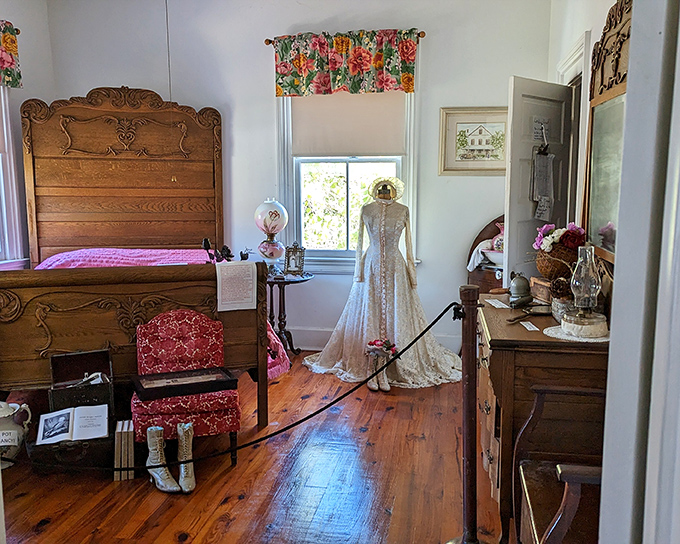 A bedroom where history and the supernatural may share the same space. That wedding dress stands so perfectly it's hard to believe it's not waiting for someone.