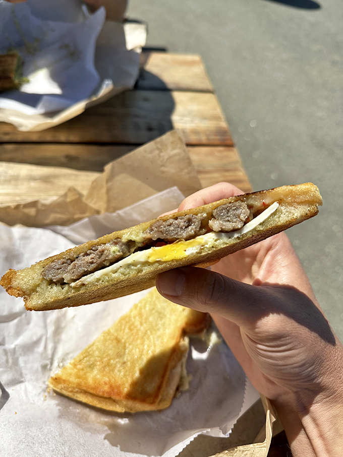 Breakfast sandwiches that make hitting the snooze button your morning's biggest regret. That golden-grilled bread with sausage and egg is sunrise in sandwich form.