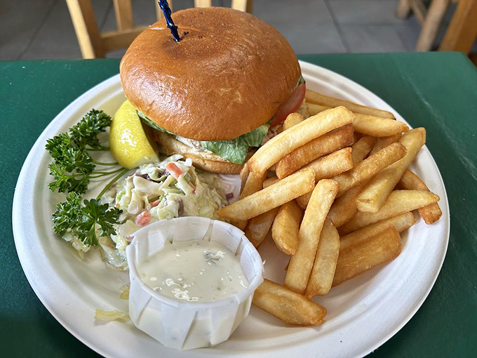 A seafood sandwich that doesn't hide behind fancy aiolis or trendy toppings&mdash;just honest-to-goodness fish on a bun with the requisite sides of happiness.