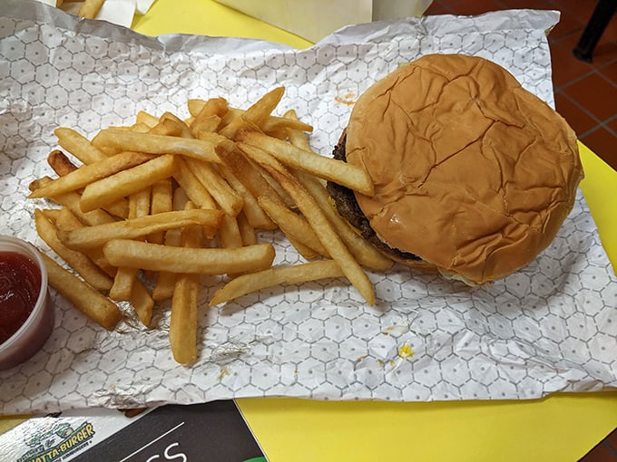 The burger-and-fries combo that launched a thousand food dreams. Simple perfection on a hexagonal paper liner.