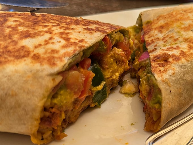 This breakfast burrito wraps up morning happiness in a tortilla, proving that fusion cuisine works beautifully in beach town settings.