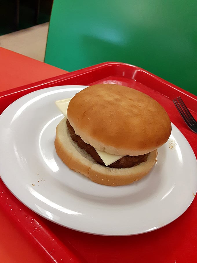 A cheeseburger that doesn't need Instagram filters or fancy aioli. Just honest beef, melty American cheese, and a soft bun that knows its role.