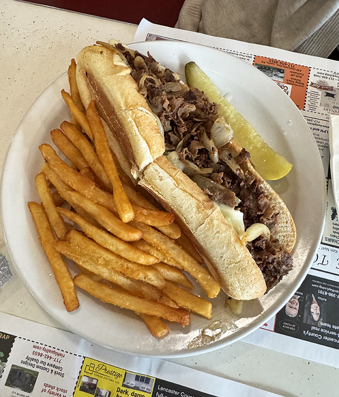 The classic Philly cheesesteak and fries&mdash;a sandwich so perfect it makes you wonder why you'd ever eat anything else.