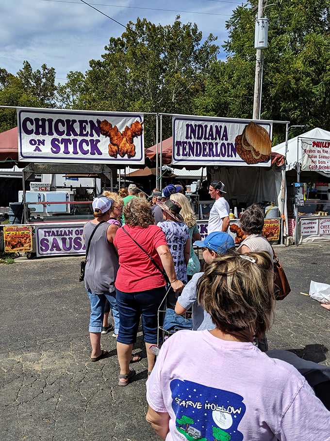 The universal language of fair food draws a hungry crowd. Indiana tenderloin sandwiches and chicken-on-a-stick &ndash; where culinary tradition meets portable convenience.