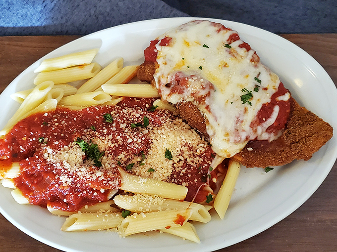 Chicken Parmesan that deserves its own zip code. Crispy cutlet, tangy sauce, melted cheese, and pasta&mdash;the Mount Rushmore of Italian-American comfort food.