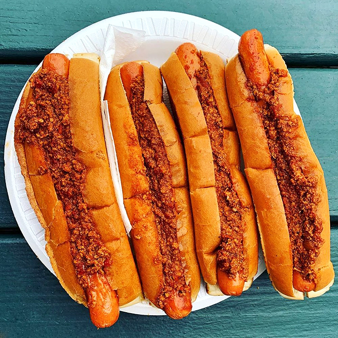Hot dogs with attitude &ndash; split, grilled, and topped with that signature chili that's worth the extra napkins and the knowing nods from regulars. 
