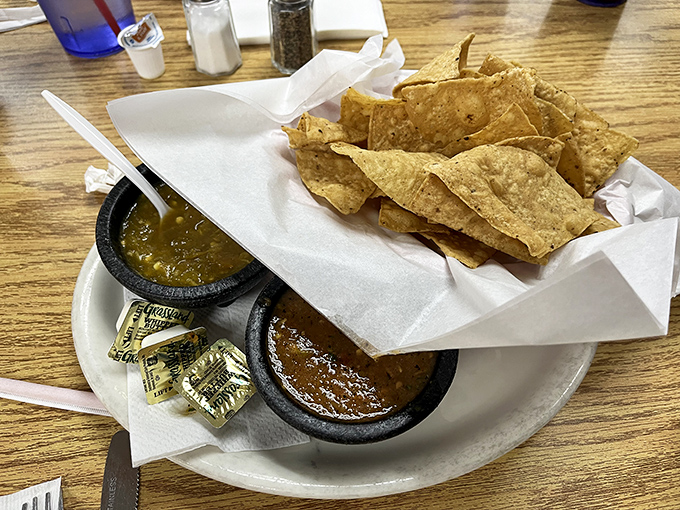 Chips and salsa—the opening act that could easily steal the whole show. That green salsa might make you consider drinking it straight.
