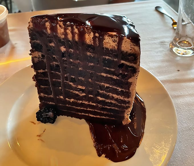 Ten layers of chocolate commitment that makes marriage look casual by comparison. This cake doesn't just satisfy cravings&mdash;it creates disciples.