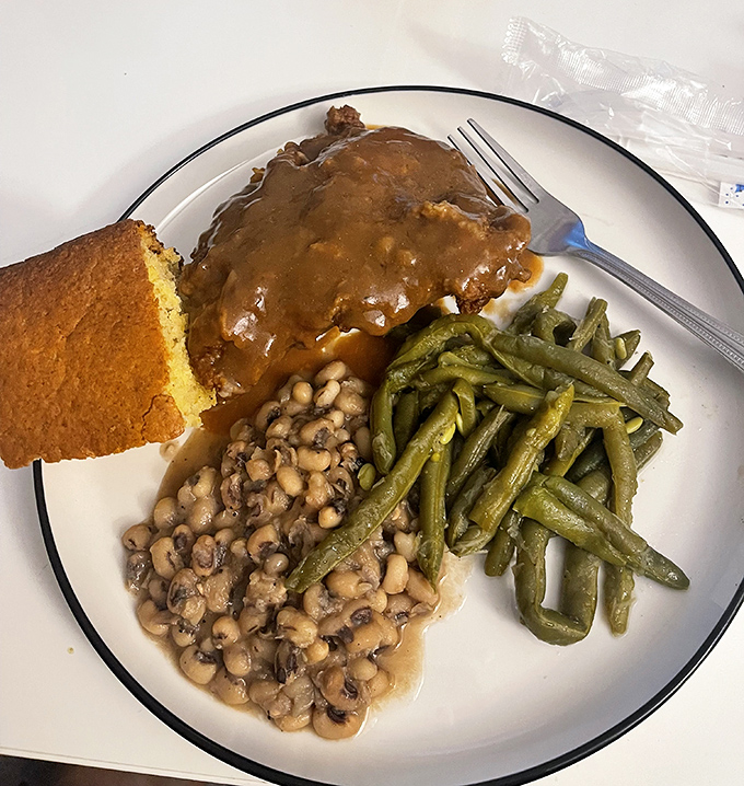 Soul on a plate&mdash;smothered goodness swimming in gravy alongside black-eyed peas and green beans that would make your grandmother nod in approval.