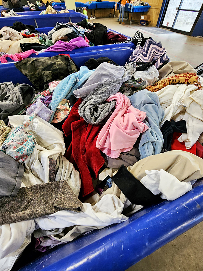 Textile mountain range with peaks of pastels and valleys of patterns. Somewhere in this fabric landscape lurks a designer label waiting to be discovered.