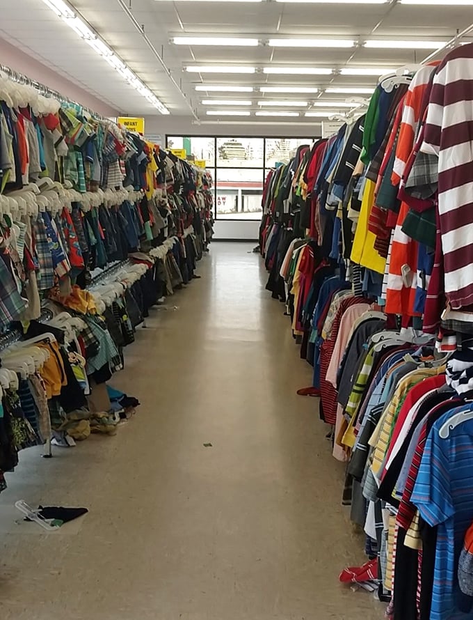 Clothing corridors stretch toward the horizon like a textile Grand Canyon. Fashion archaeologists can excavate through decades of style with each rack.