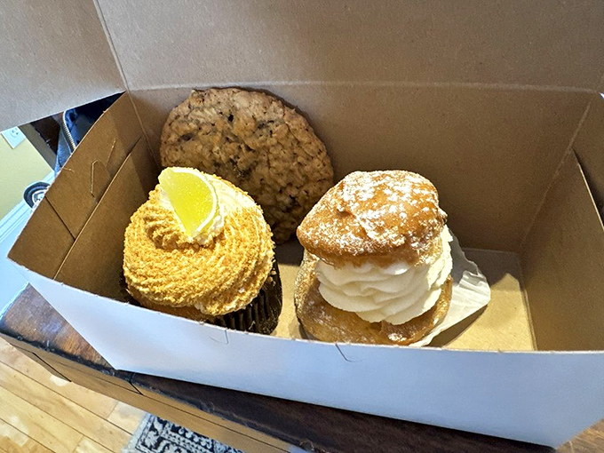 A bakery box that's better than any gift-wrapped present. That lemon cupcake is practically doing jazz hands, saying "Pick me! Pick me!"