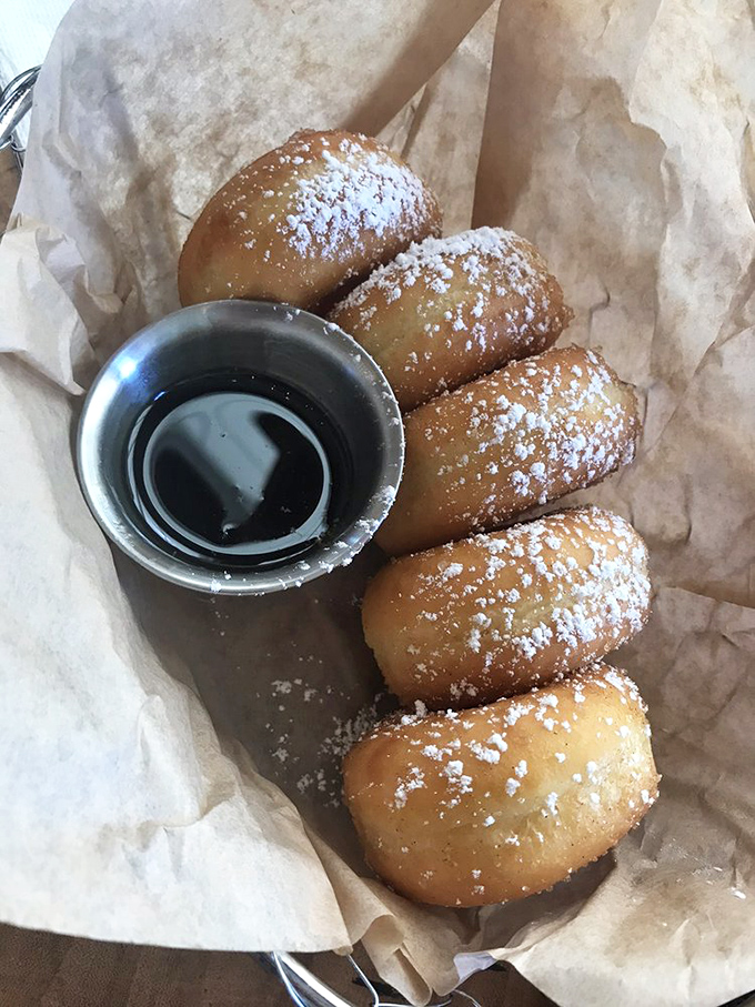 Powdered sugar-dusted doughnuts with maple dipping sauce&mdash;because sometimes breakfast should feel like getting away with dessert.