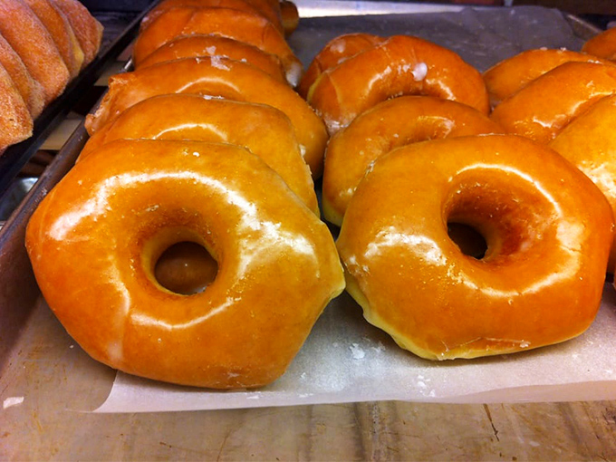 Glazed donuts lined up like soldiers ready for duty&mdash;the duty of making your morning coffee feel like it's found its soulmate.