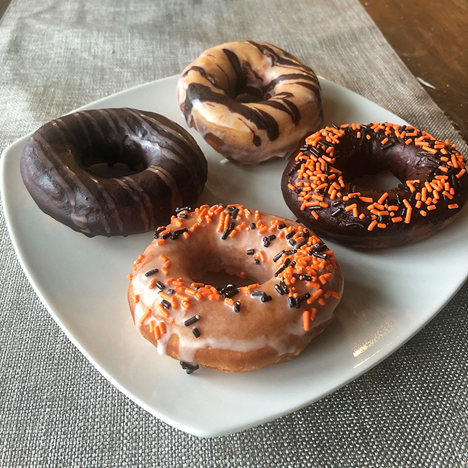 Donut diplomacy at its finest. These glazed ambassadors of joy prove that happiness can indeed be found in a perfect circle with sprinkles.