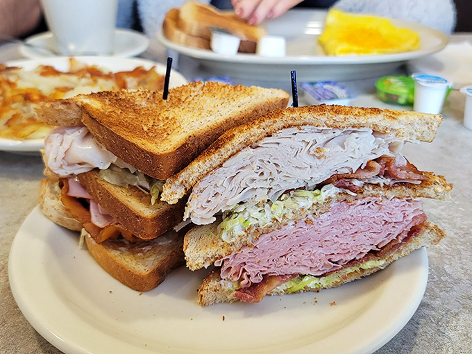 This double-decker sandwich isn't just lunch&mdash;it's architecture. Three perfectly toasted slices creating a skyscraper of satisfaction.