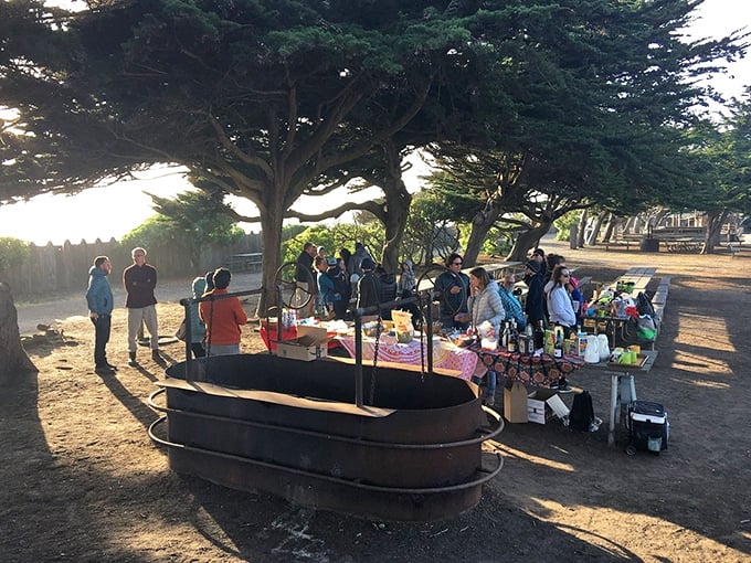 Community gatherings under Cambria's pines&mdash;where potlucks become memory-making events and strangers quickly become friends over shared dishes.