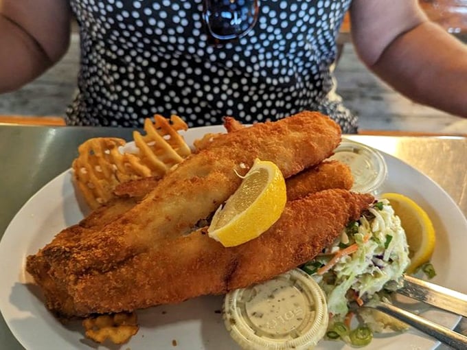 The star of the show &ndash; perfectly golden fish with a crisp exterior giving way to flaky white fish that would make a British pub proud.