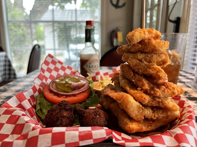 Golden perfection meets oceanic bliss in this towering fish sandwich that redefines the meaning of "catch of the day."