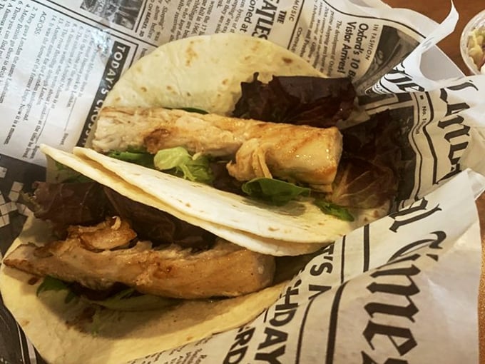 Fish tacos: where British fish-frying expertise meets Florida's love of handheld meals. Cultural fusion never tasted so crispy and fresh.